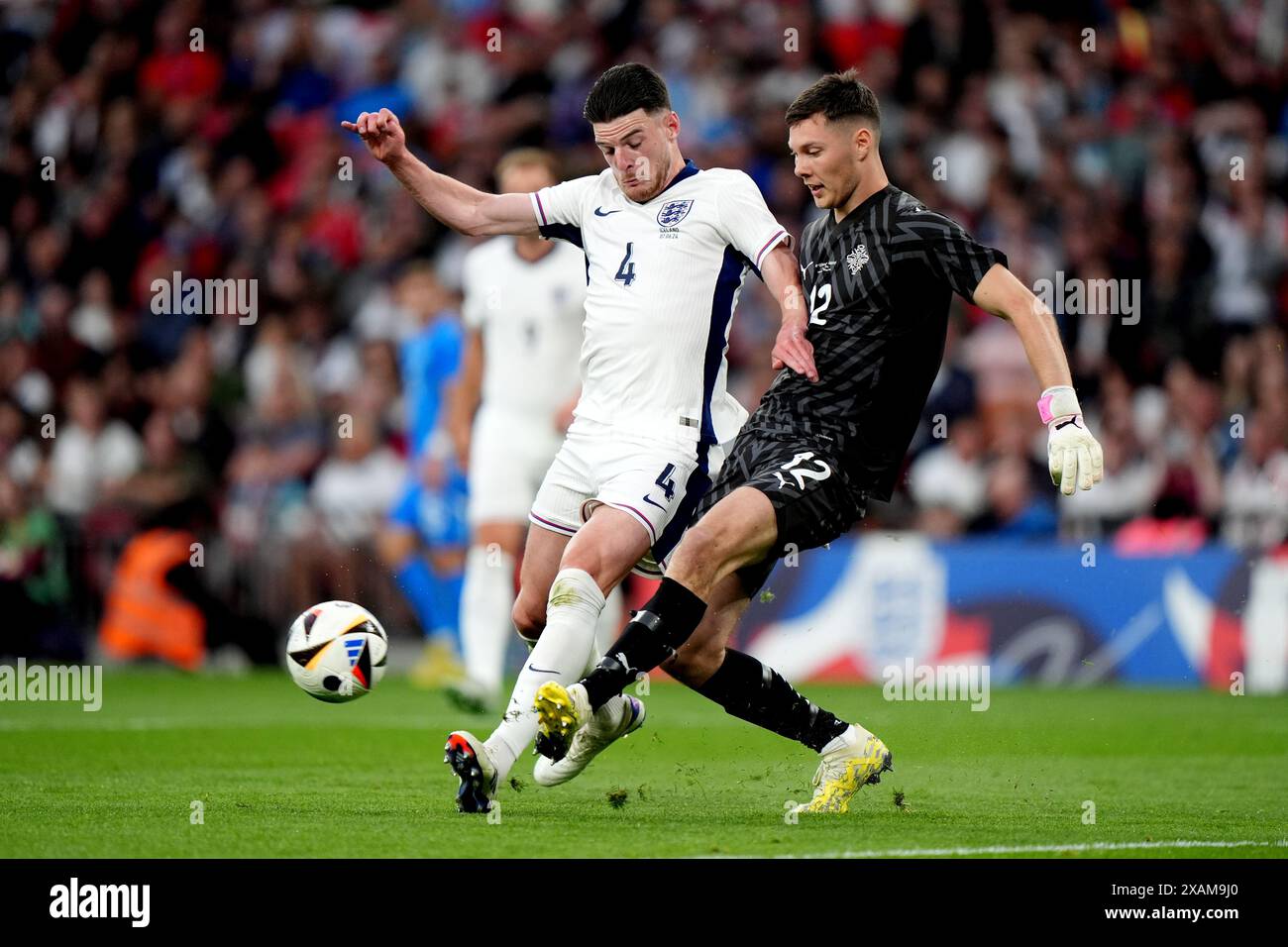 England's Declan Rice challenges Iceland goalkeeper Hakon Valdimarsson ...