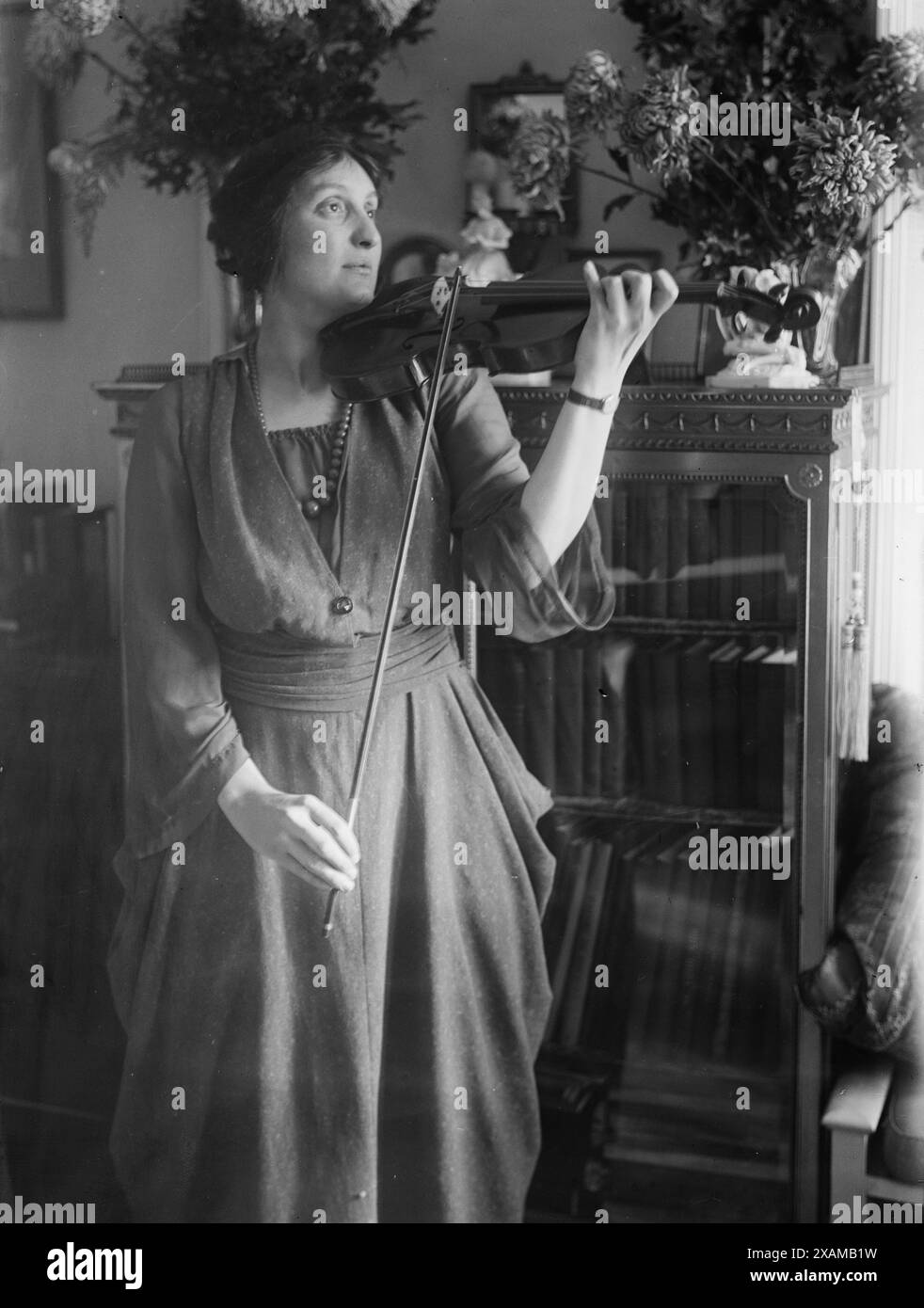 Rosalie Miller [playing violin], between c1915 and c1920. Shows singer ...