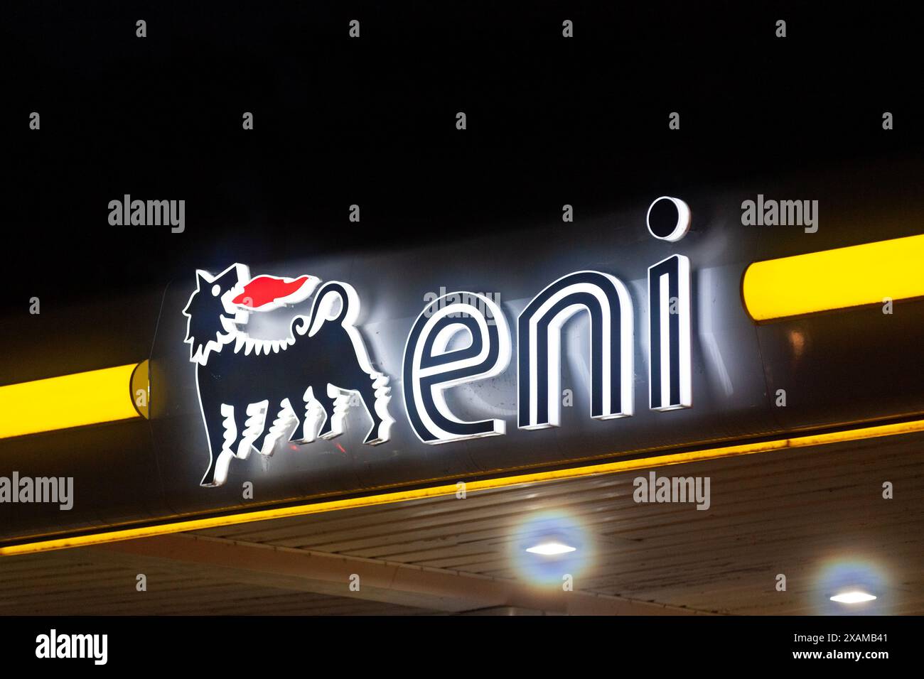 Larnaca, Cyprus - March 07 2024: Illuminated sign at night of Eni, an ...