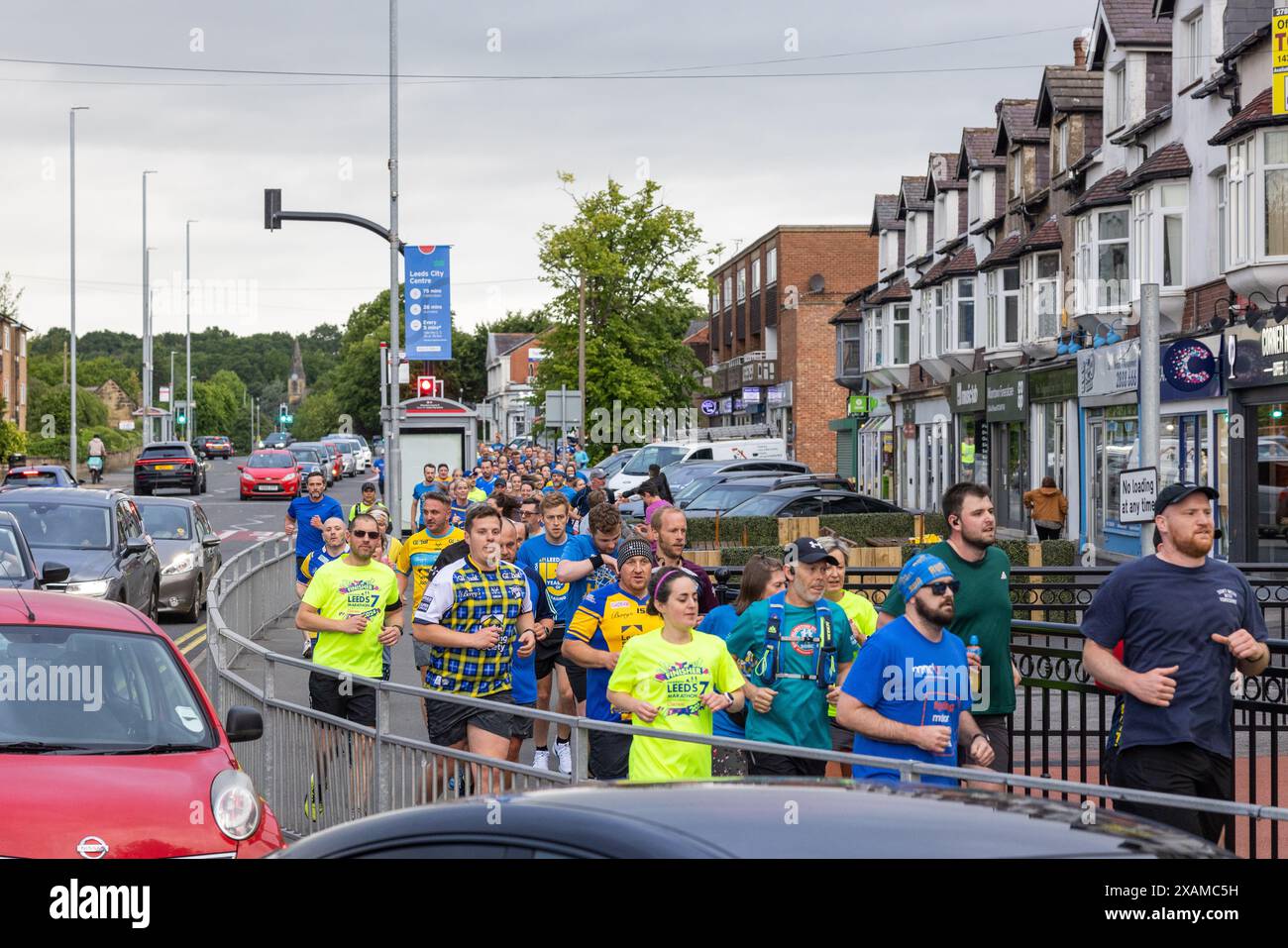 Leeds, UK. 07 JUN, 2024. Runners make their way through moortown as ...