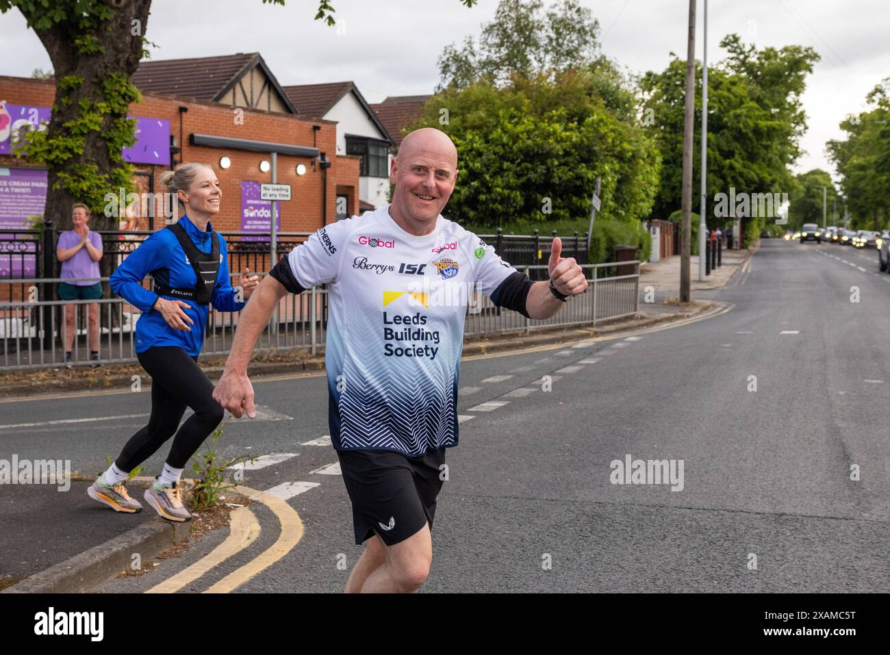 Leeds, UK. 07 JUN, 2024. Runner poses to camera as they take part in 7 ...