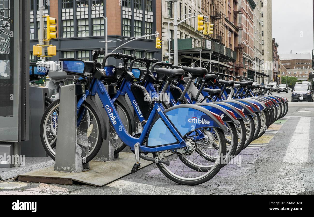 NEW YORK, NEW YORK, USA - JUNE 06, 2024: A row of Citibikes, a popular ...