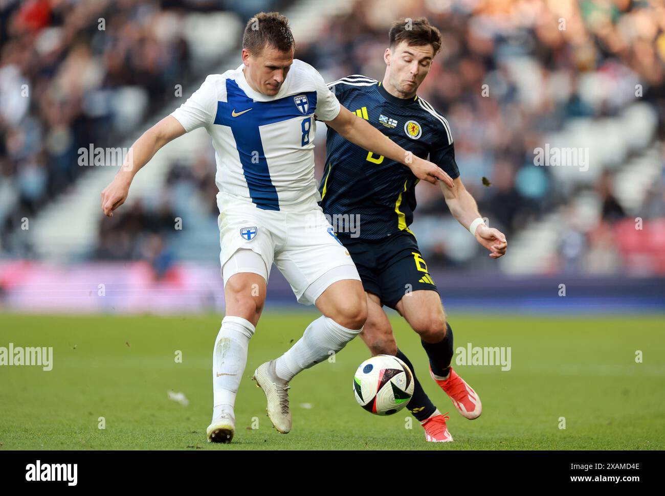 Finland's Robin Lod (left) and Scotland's Kieran Tierney battle for the ...