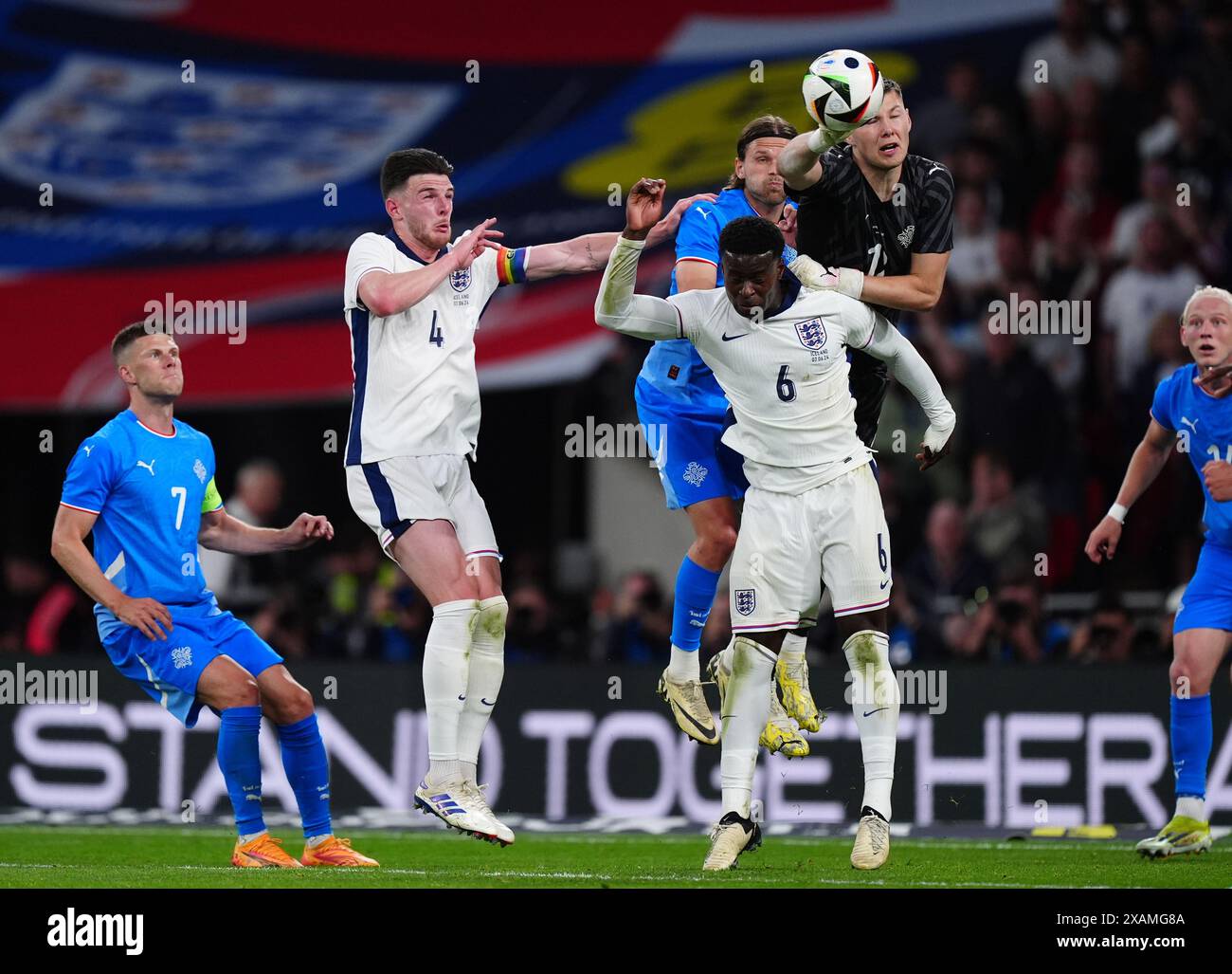 Iceland goalkeeper Hakon Valdimarsson punches clear from England's Marc ...