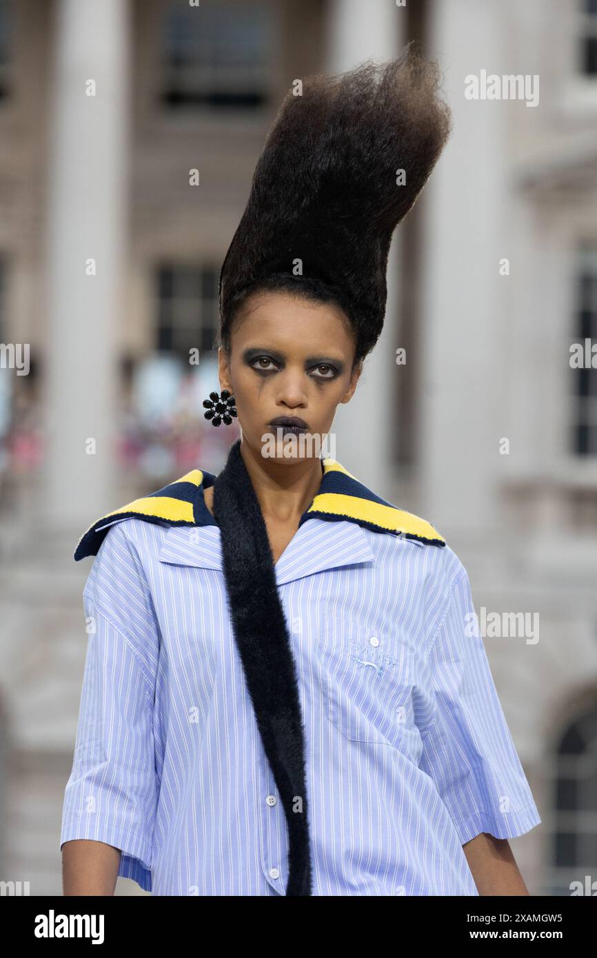 London, UK. Friday June 7, 2024. A model on the catwalk at the Charles ...