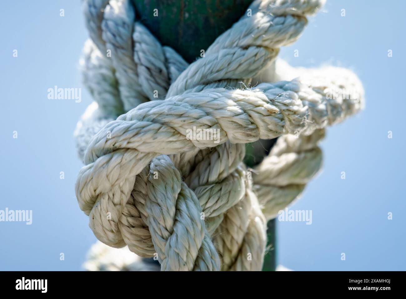 Old rope tied wooden pole hi-res stock photography and images - Alamy