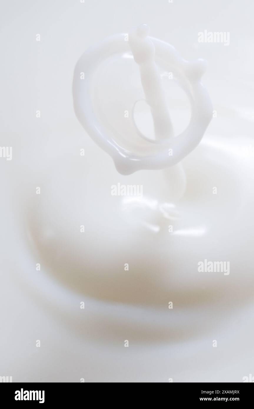 Milk ripple, Milk drop Stock Photo - Alamy