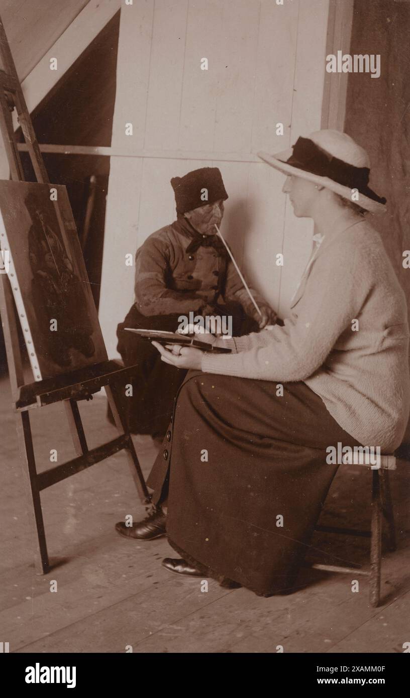 Maud Sherwood painting a dutchman with a clay pipe, 1913 Stock Photo ...