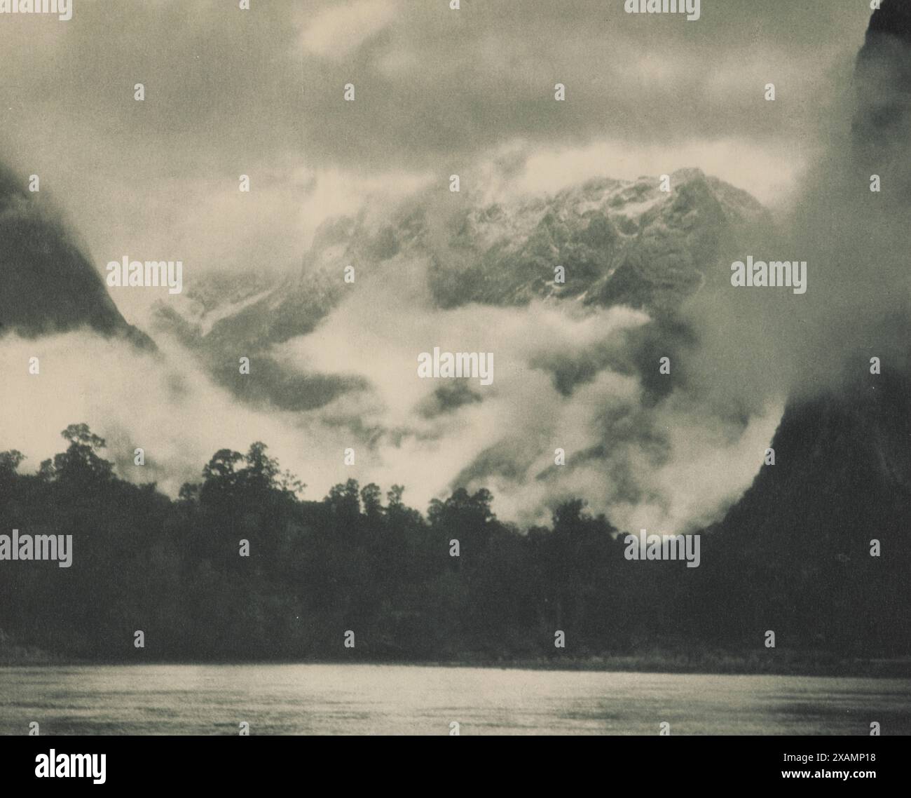 Mountain mists, Lake Ada, Milford Sound, 1920s Stock Photo - Alamy