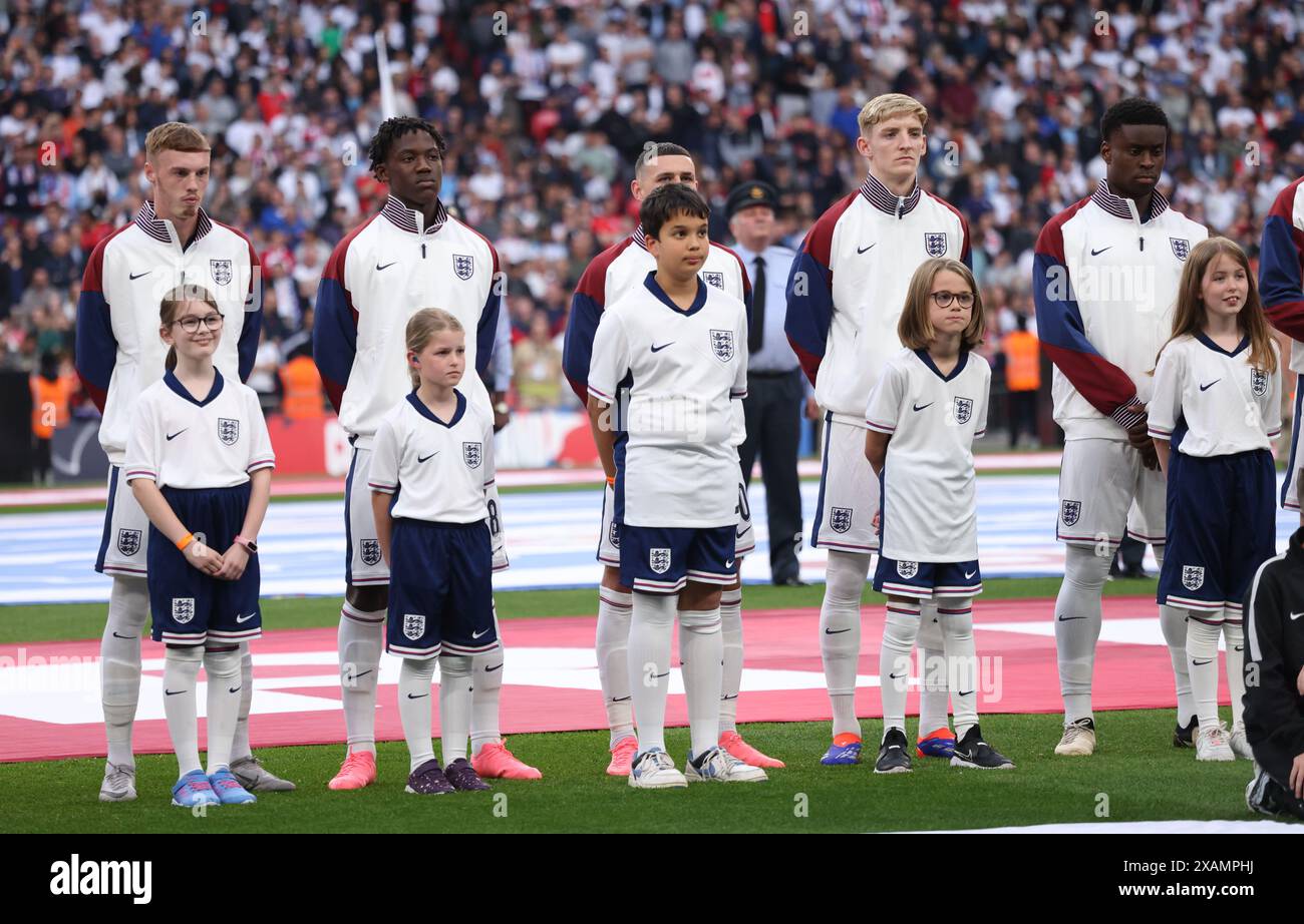 London, UK. 07th June, 2024. England players line up, with Phil Foden ...
