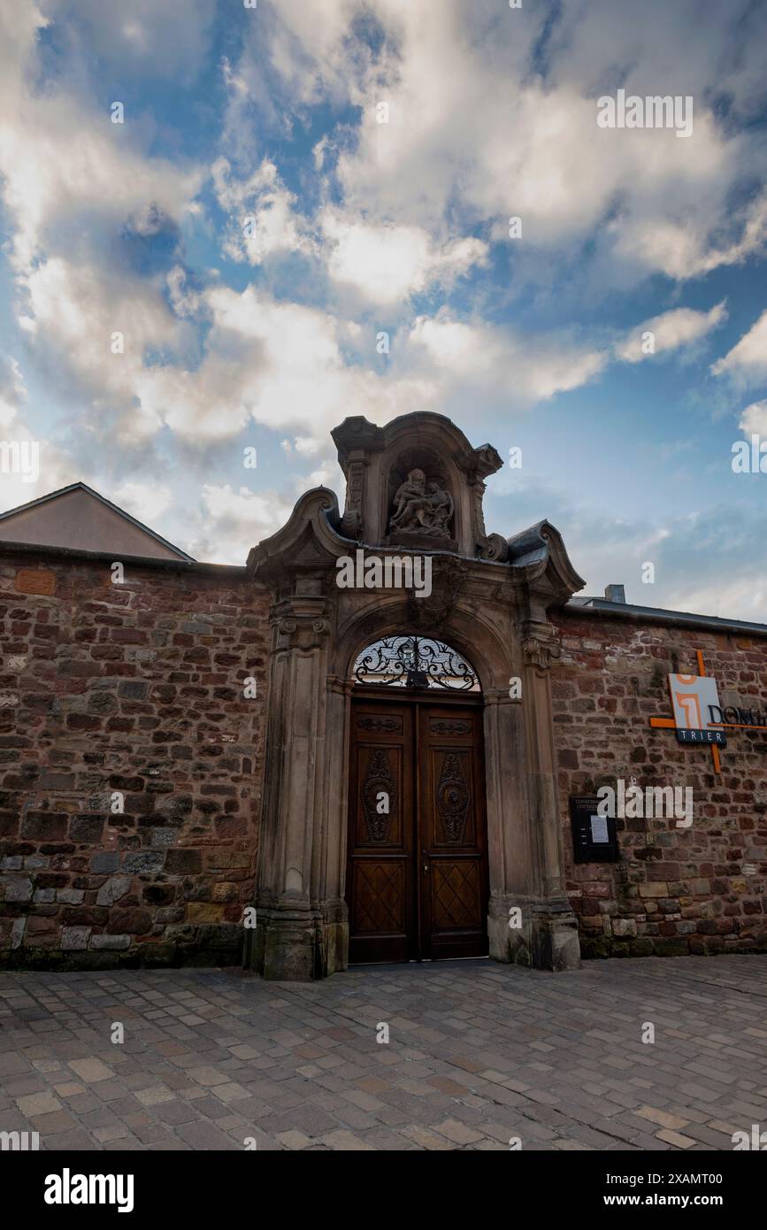 Romanesque arched gate across from Trier Cathedral in Germany Stock ...