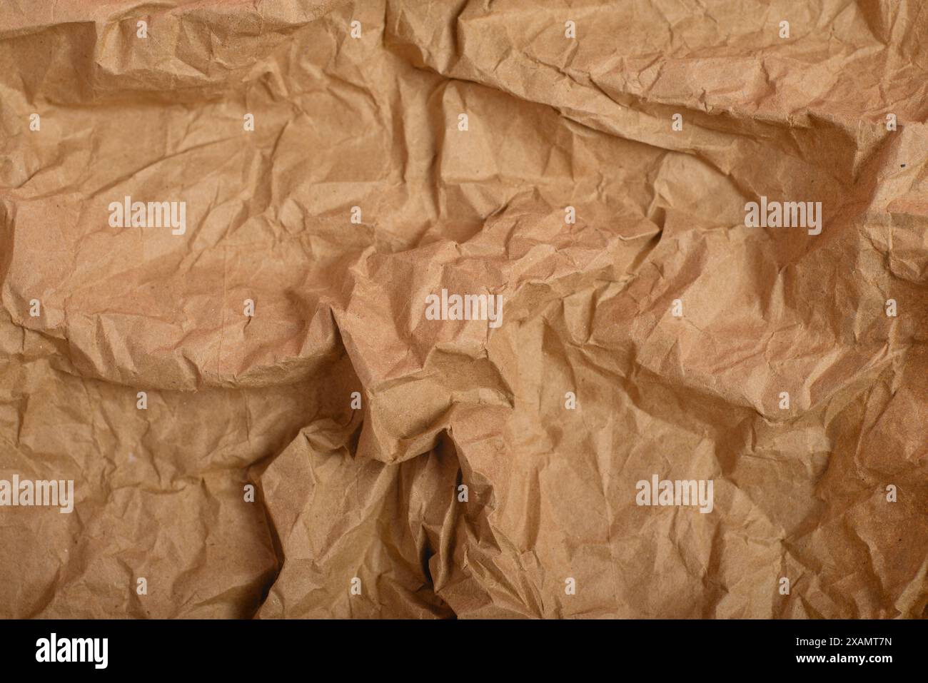 Wrinkled craft paper. Textured background Stock Photo - Alamy