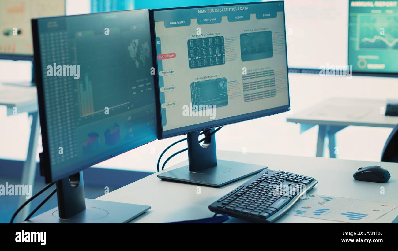 Empty boardroom meeting space with computer at workstations used to solve daily organizational ...