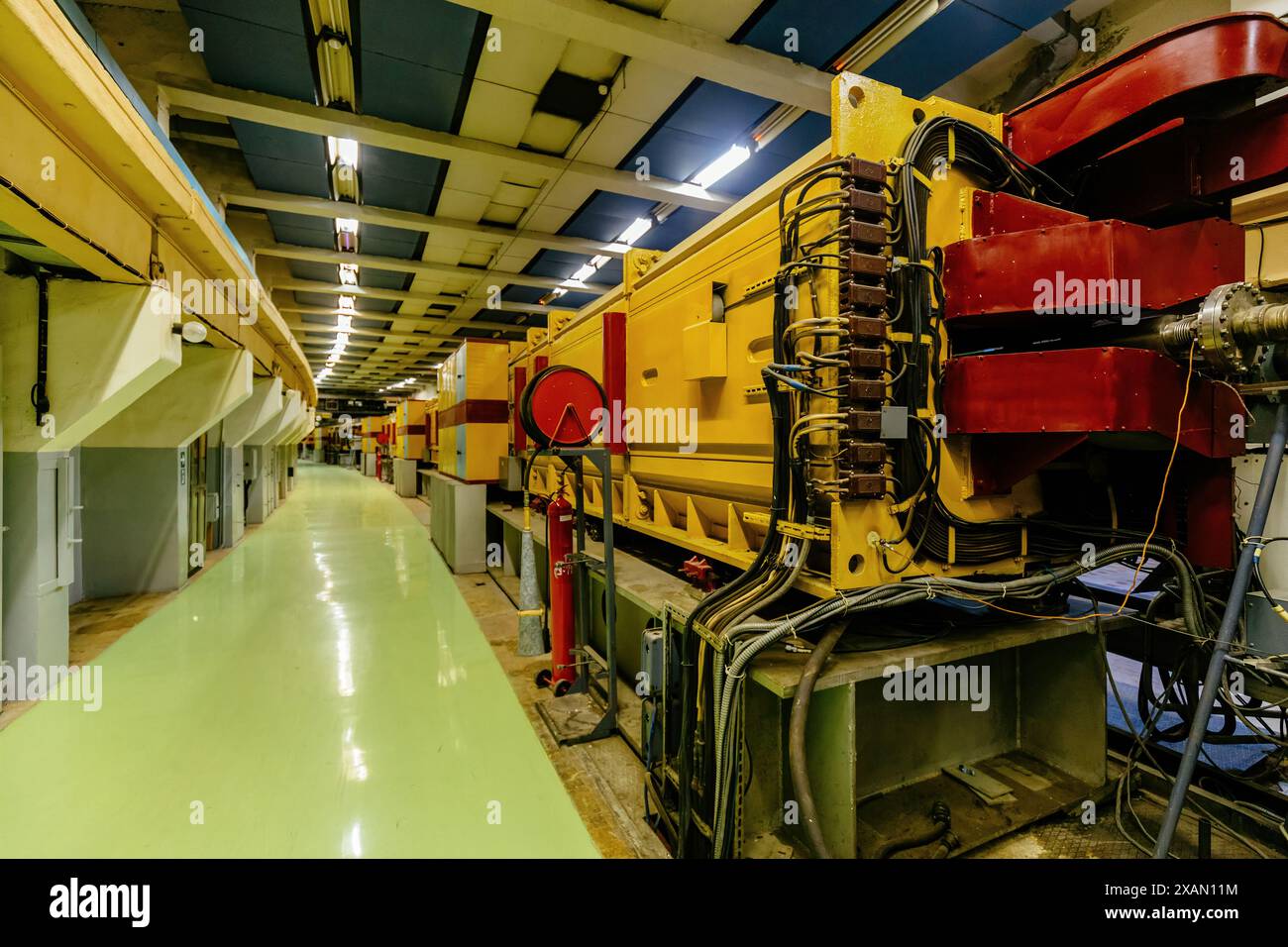 Scientific equipment of hadron collider in empty hallway. Old ...
