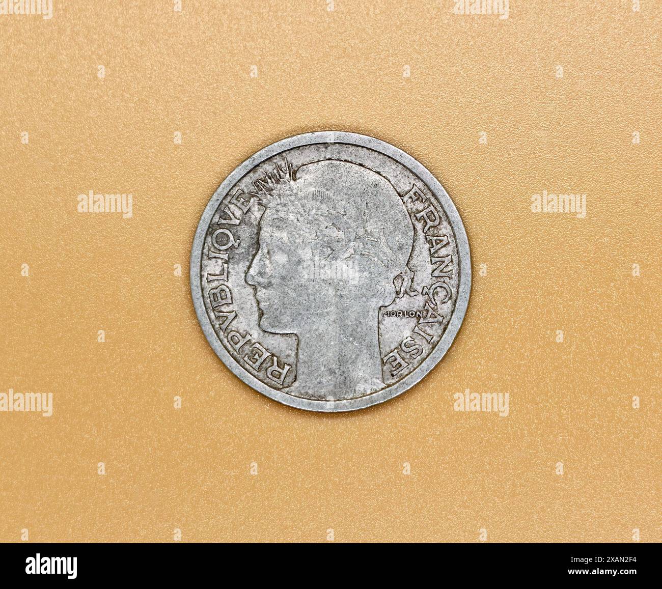 Photo close up of the obverse of a 1957 French 1 franc silver coloured ...