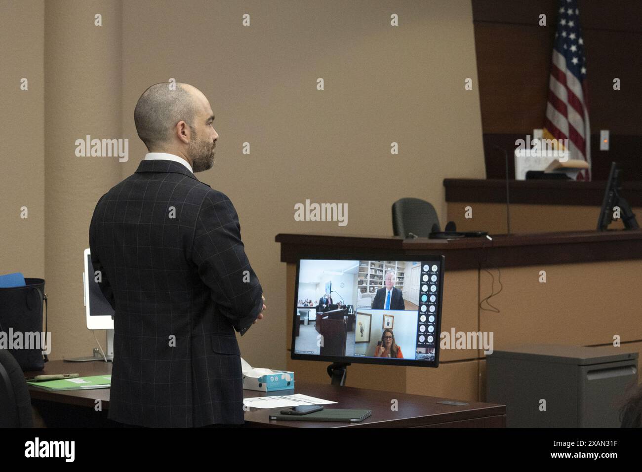 Arizona Attorney General Criminal Division Chief Nick Klingerman, left ...