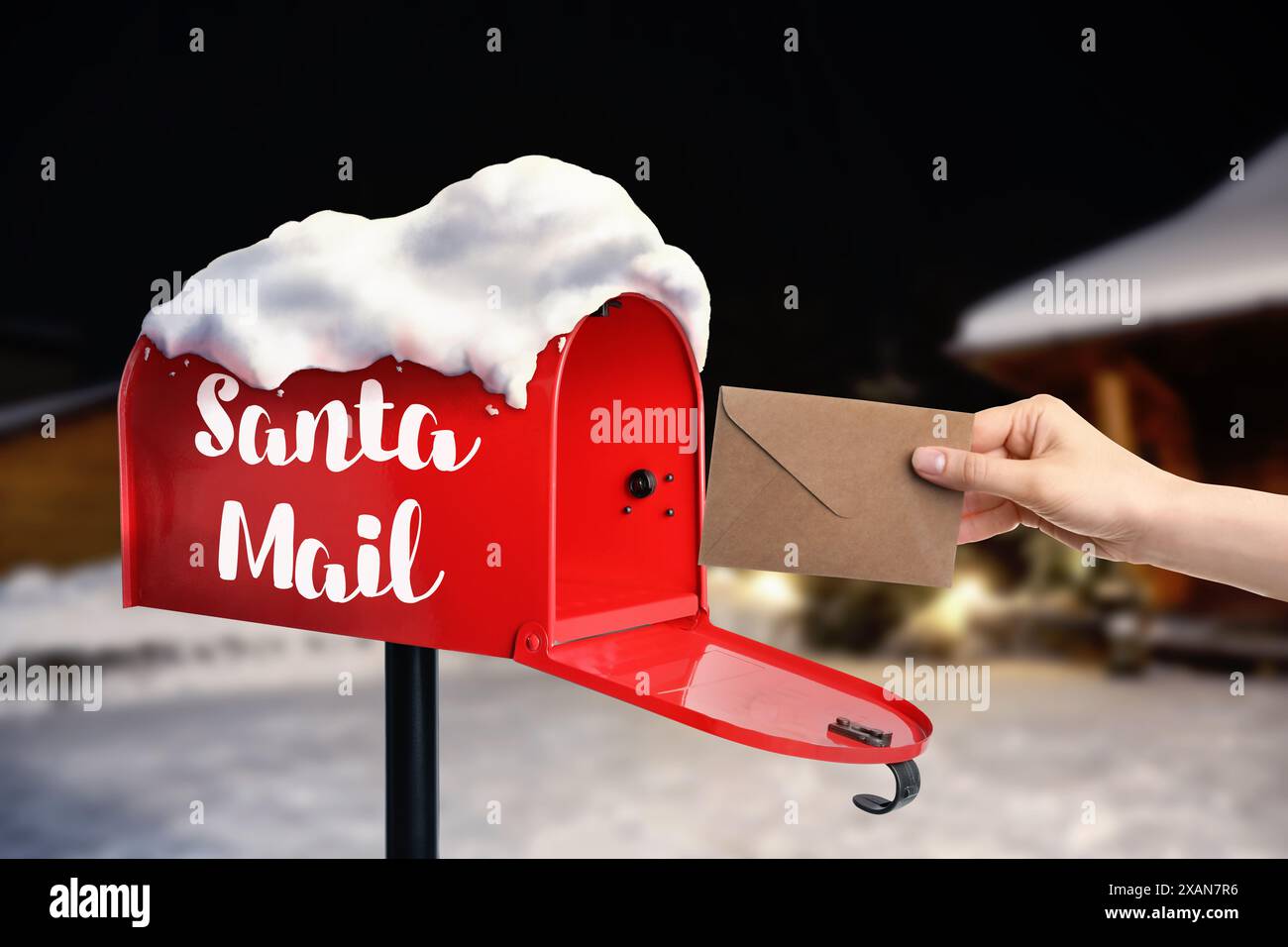 Woman letterbox home hi-res stock photography and images - Alamy