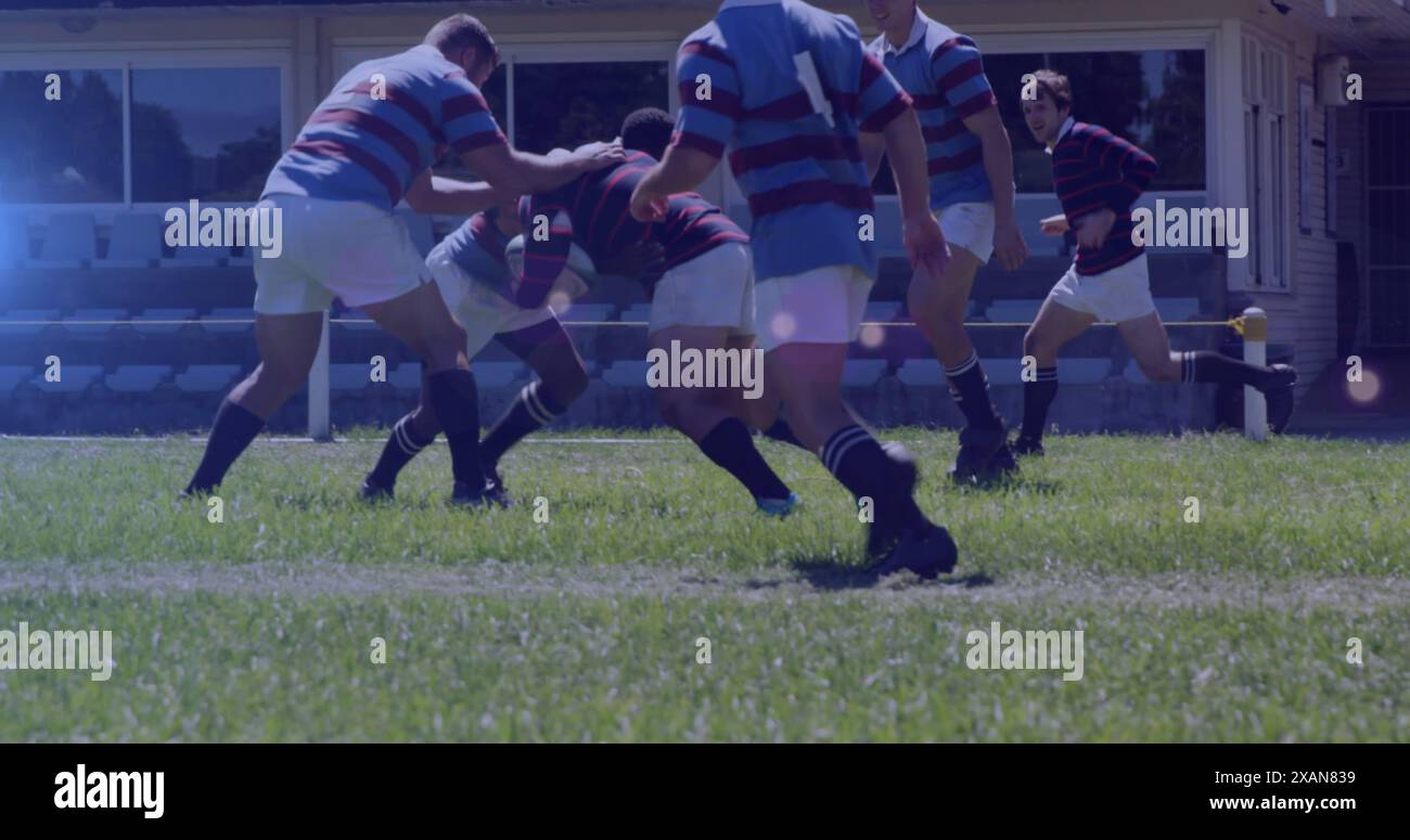 Image of glowing lights over diverse rugby players in sports stadium ...
