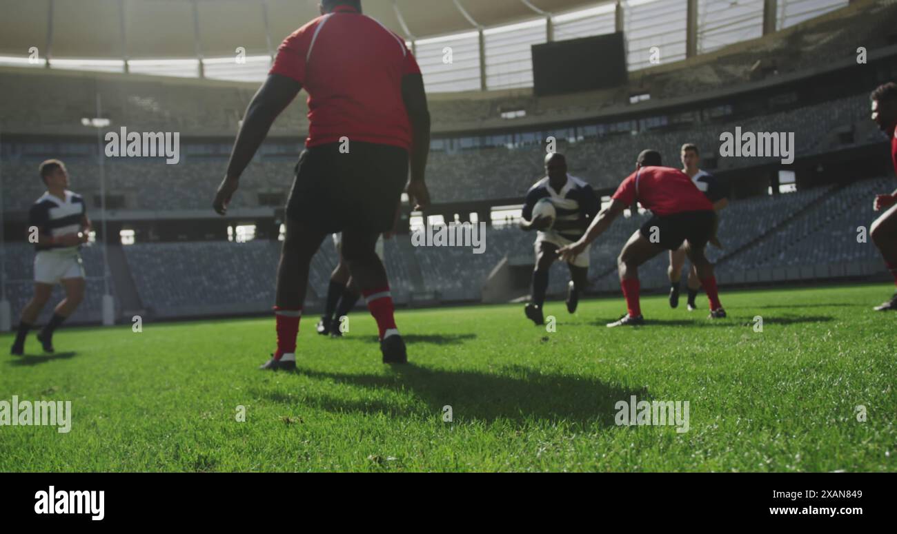 Image of glowing lights over diverse rugby players in sports stadium ...
