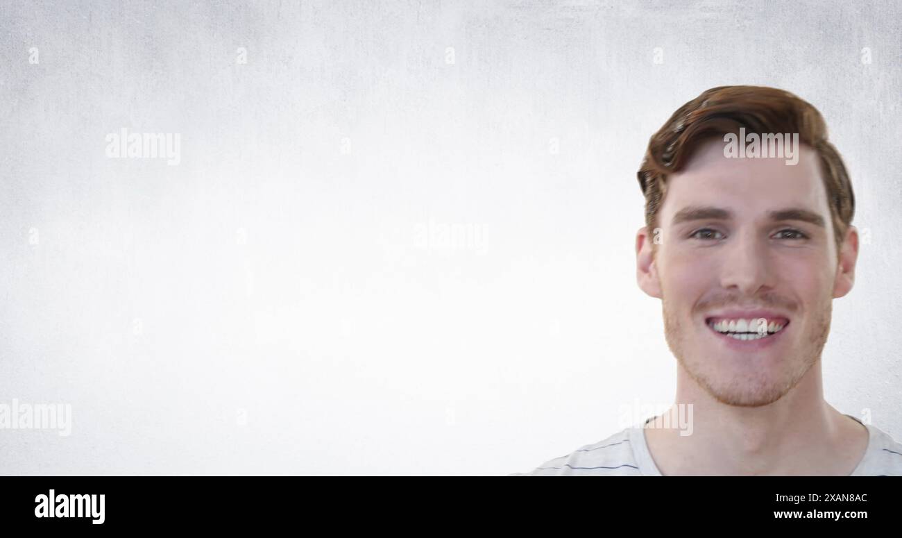 Image of portrait of caucasian man smiling against grey textured ...