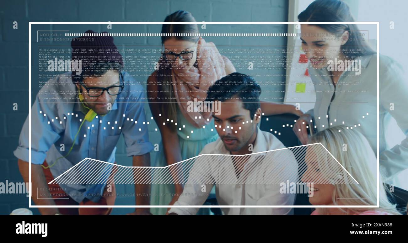 A diverse group of young and middle-aged colleagues is collaborating on ...