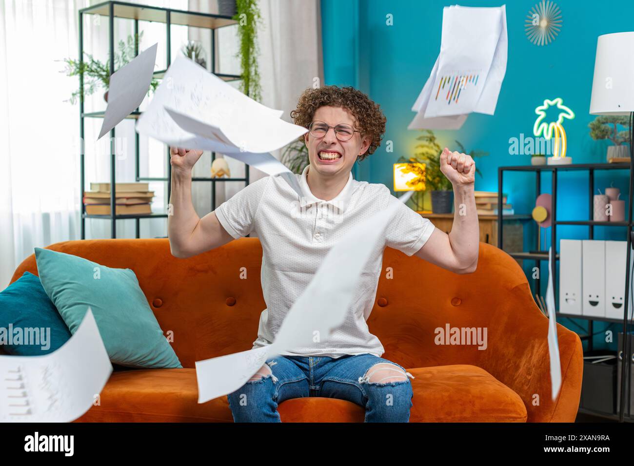 Furious man throwing chart papers hi-res stock photography and images ...
