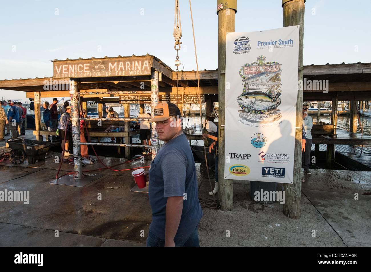 Proud anglers pose with their impressive catch at the end of a ...