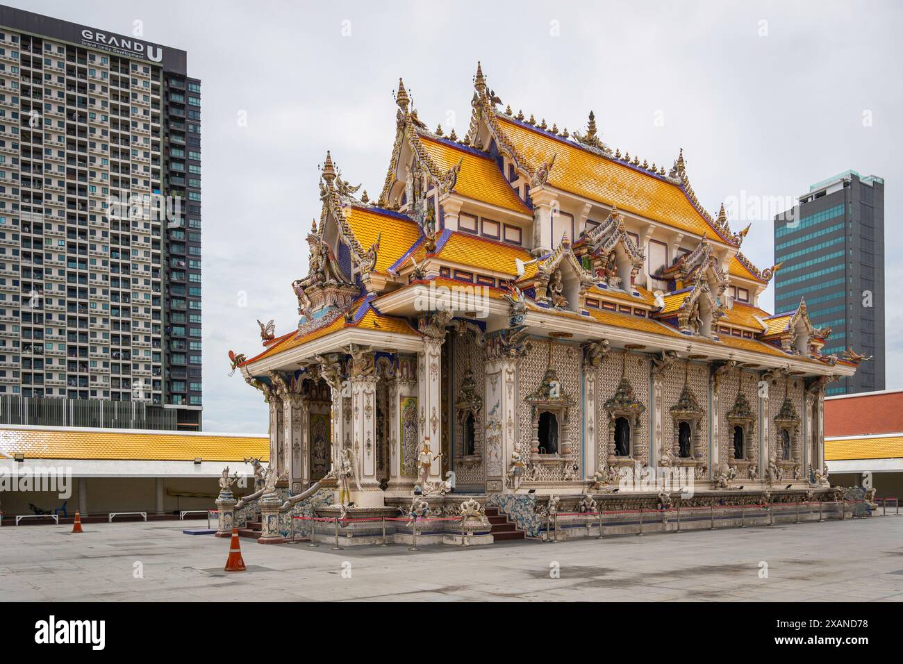 A large view of Wat Pariwat Temple which is surrounded by modern high ...