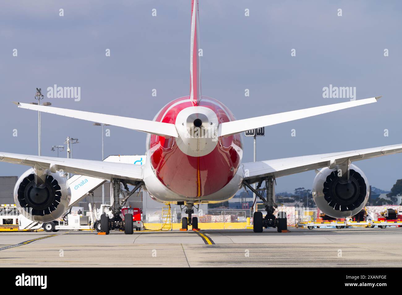 Aeroplane tail fin abstract view showing airport exterior, jet engines ...