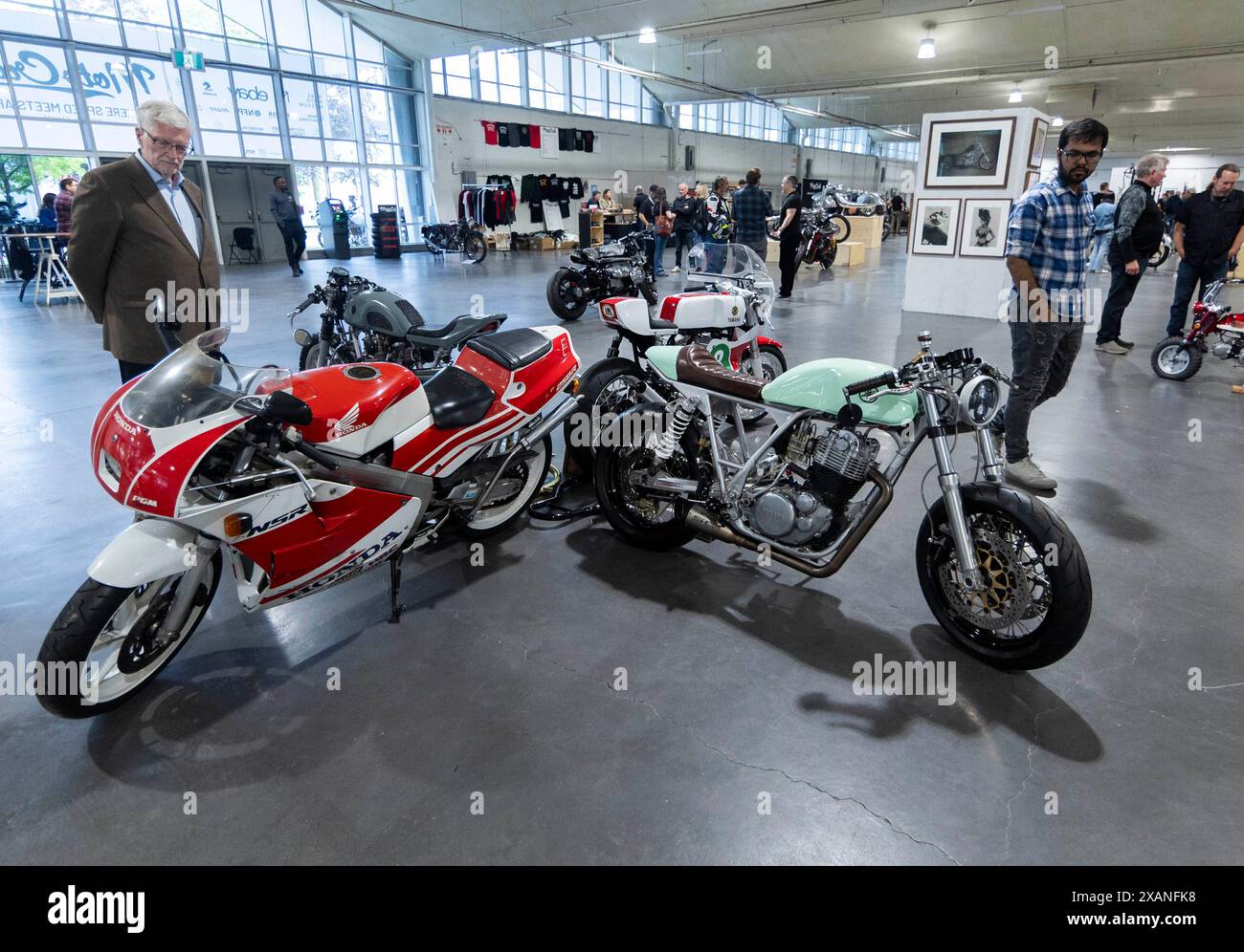 Toronto, Canada. 7th June, 2024. People look at custom motorcycles ...