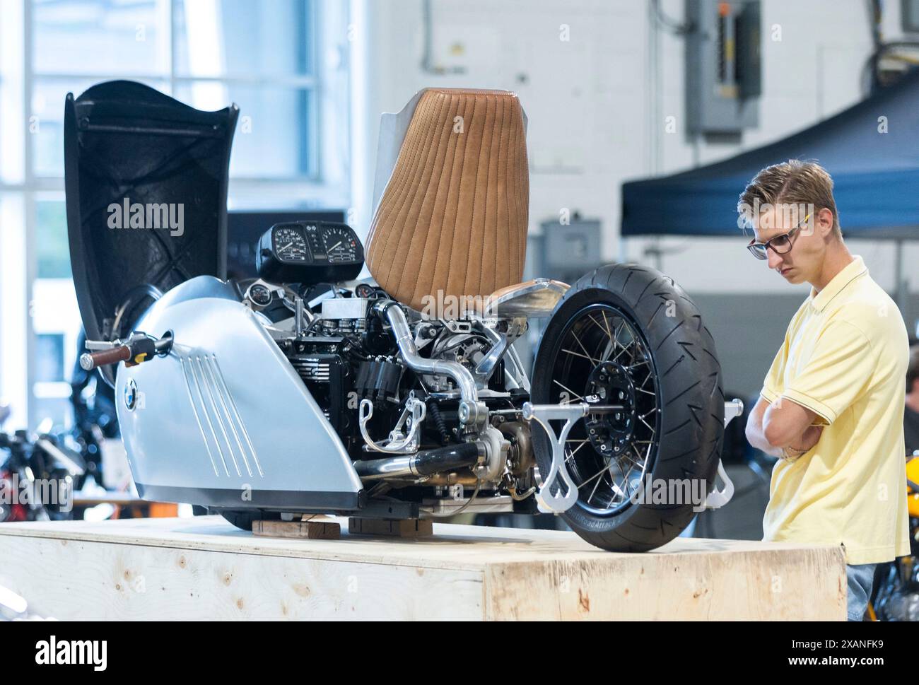 Toronto, Canada. 7th June, 2024. A visitor looks at a custom motorcycle ...