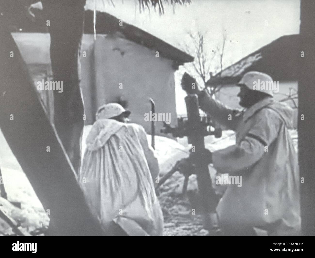 German soldiers fire a mortar in the snow hi-res stock photography and ...