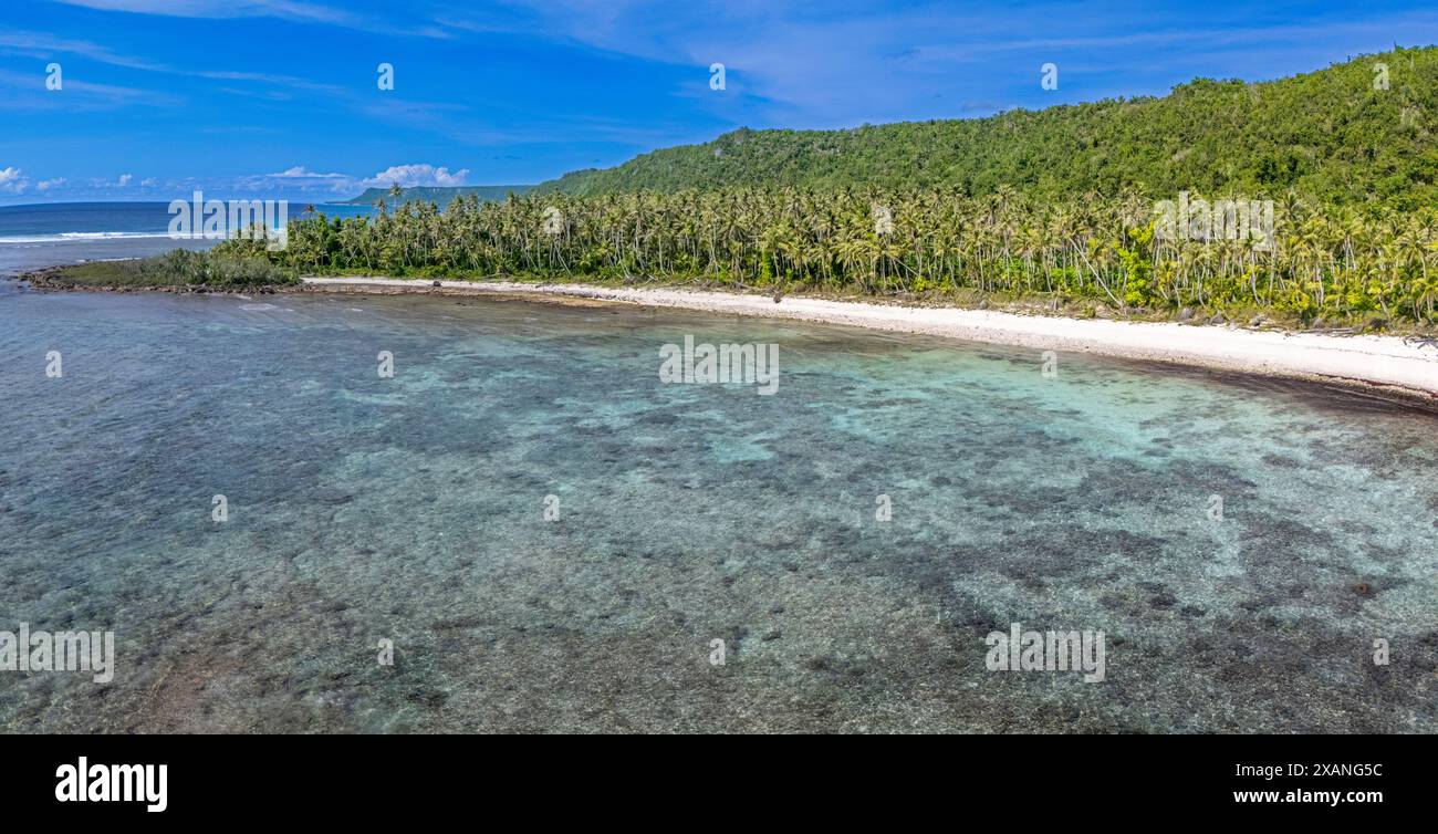 An aerial panorama of the clear warm waters at Hilaan Beach, Guam ...