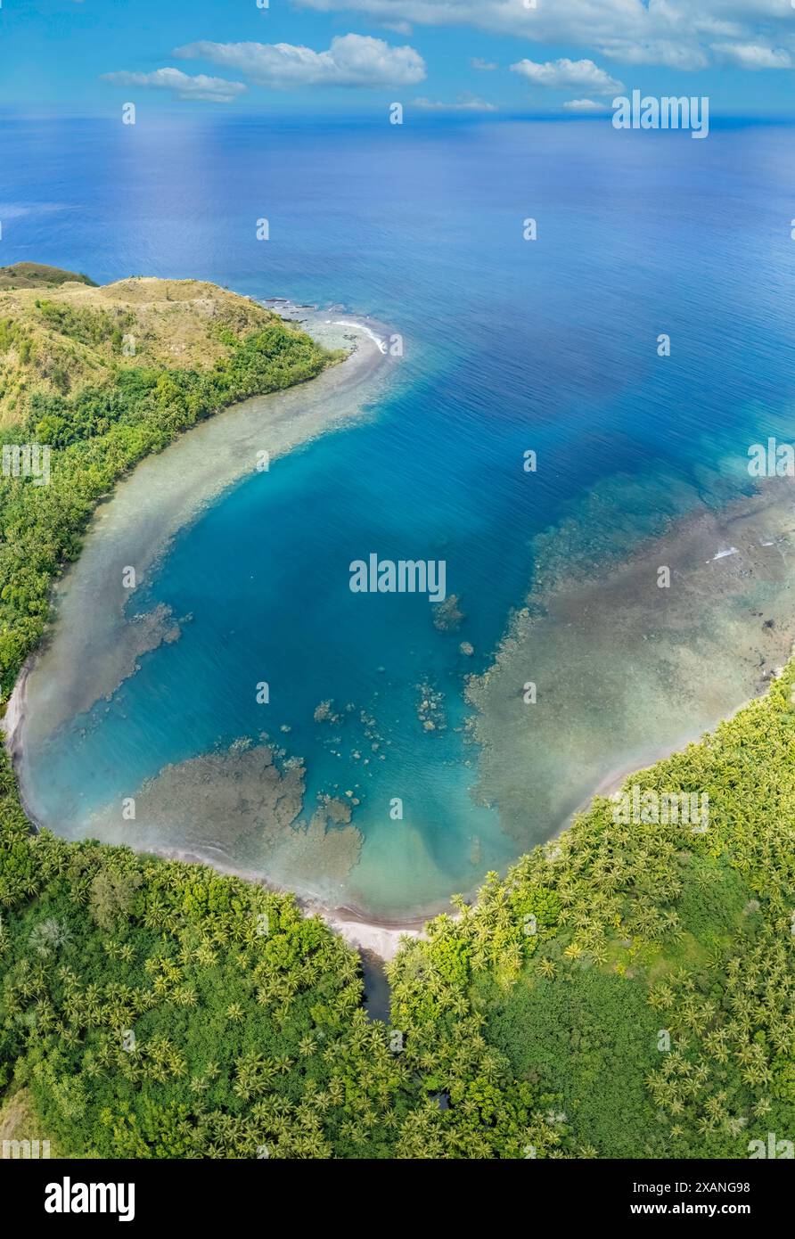 An aerial panorama of Cetti Bay between the villages of Agat and Umatac, on the west coast of ...