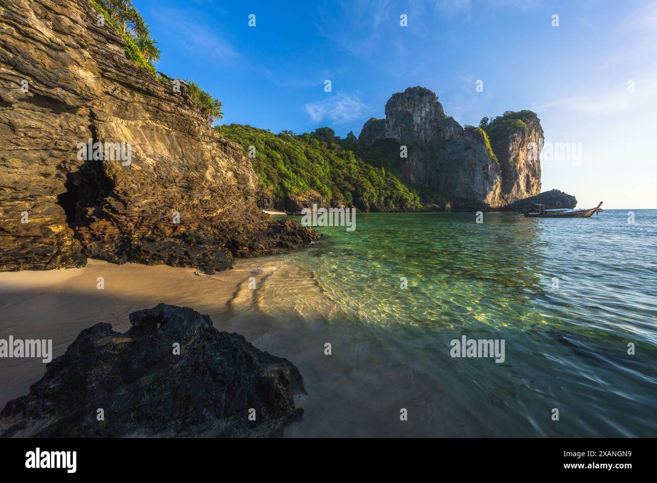 beautiful sunset at nui beach on ko phi phi in thailand Stock Photo - Alamy