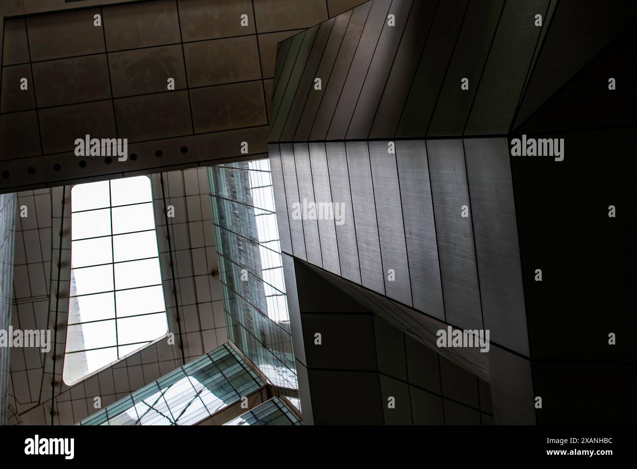 Looking up from the ground floor portico area beside the entrance to ...