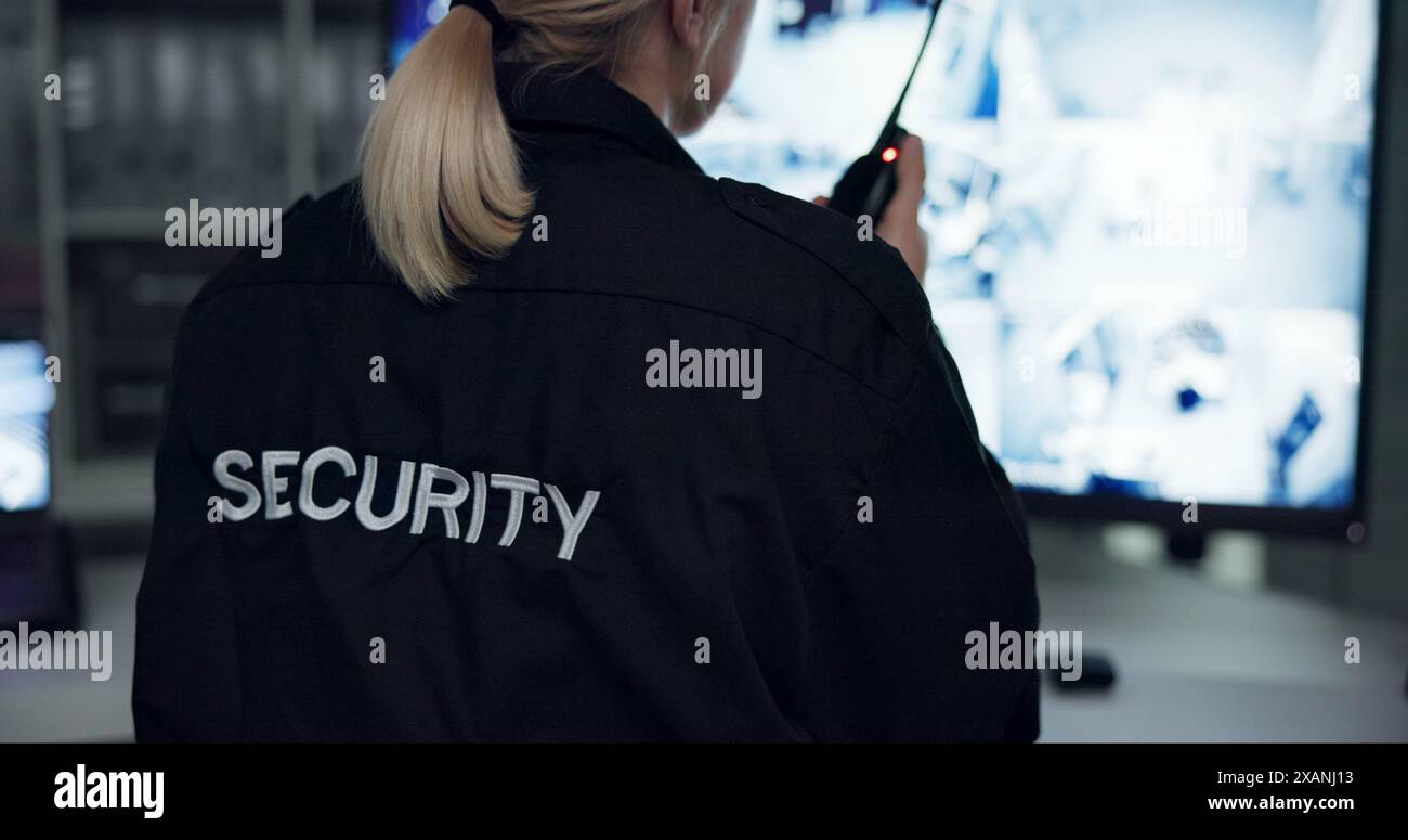 Security guard, radio and woman by cctv monitor for property protection ...