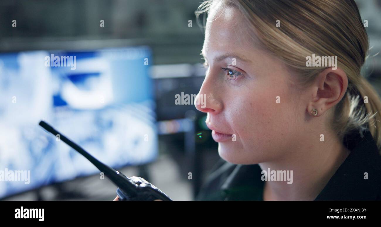 Communication, security and woman with radio, monitor and watch of cctv ...