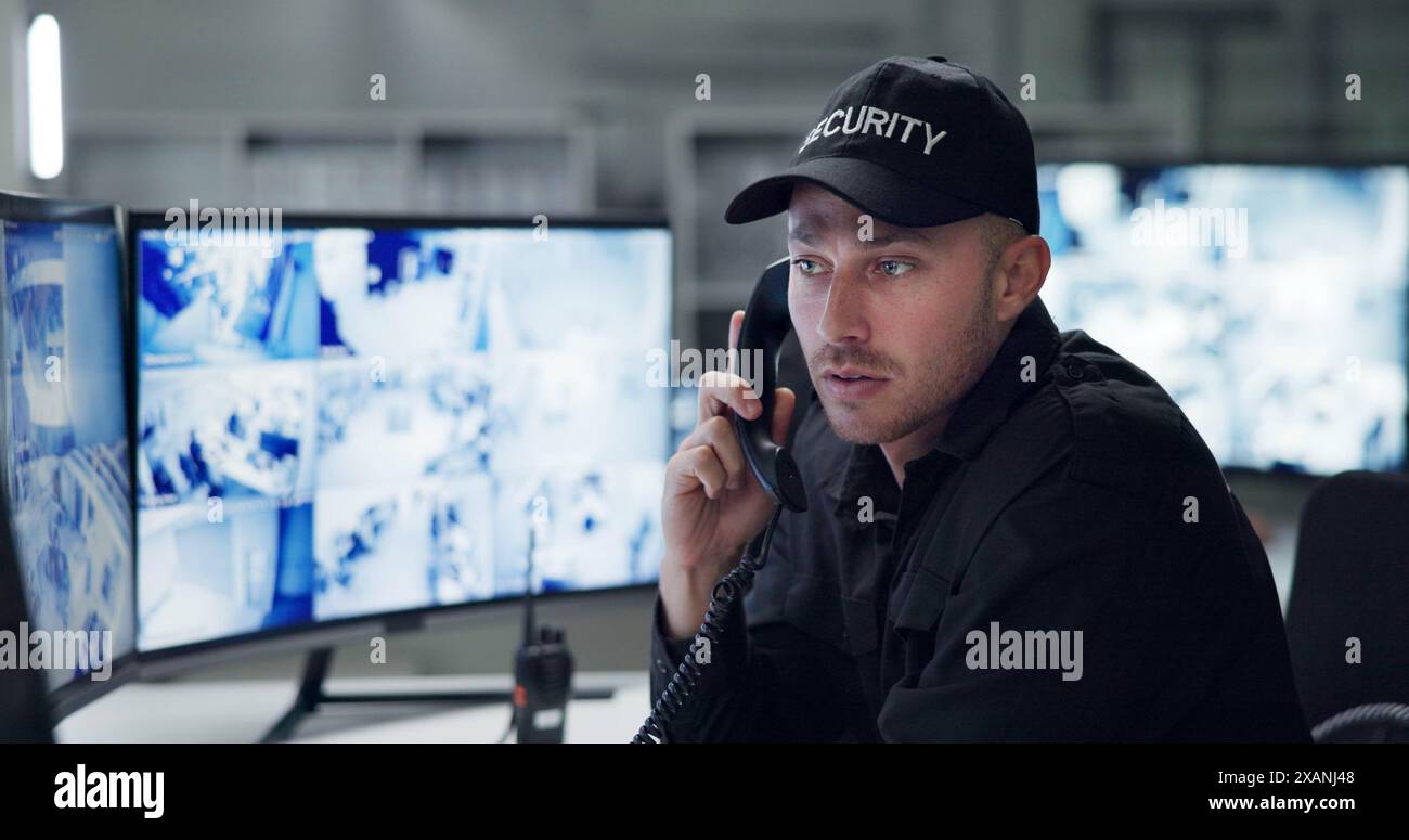 Security guard, phone call and speaking by cctv monitor for protection ...