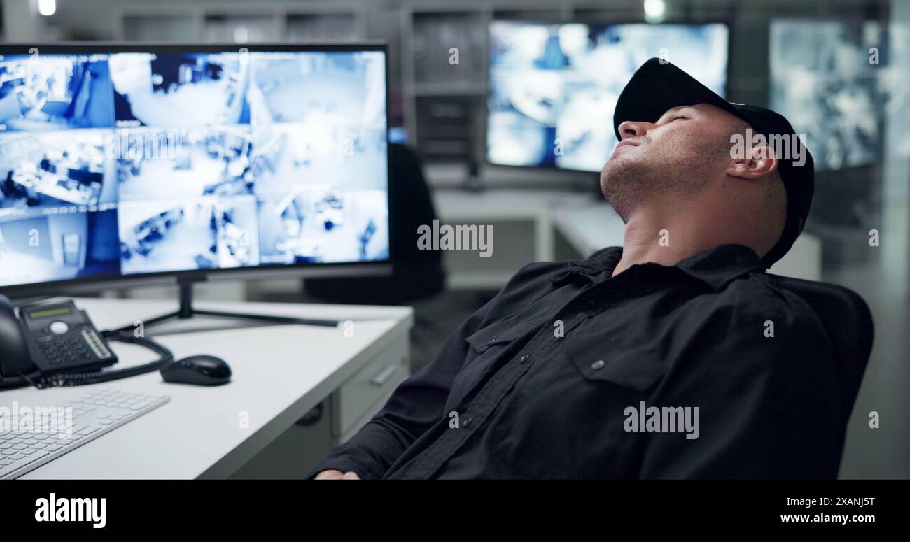 Security guard, computer screen and tired by cctv monitor for ...