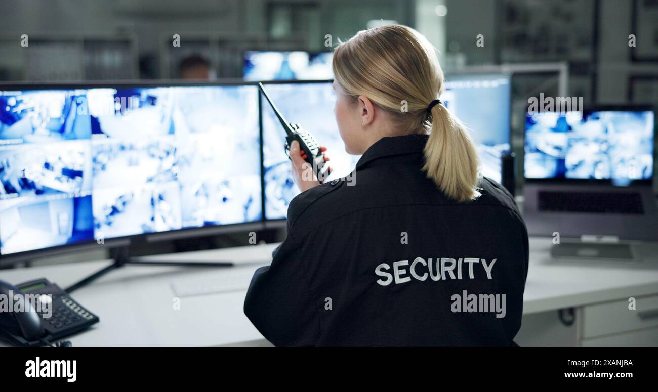 Communication, security and woman with radio, cctv and monitor to watch ...