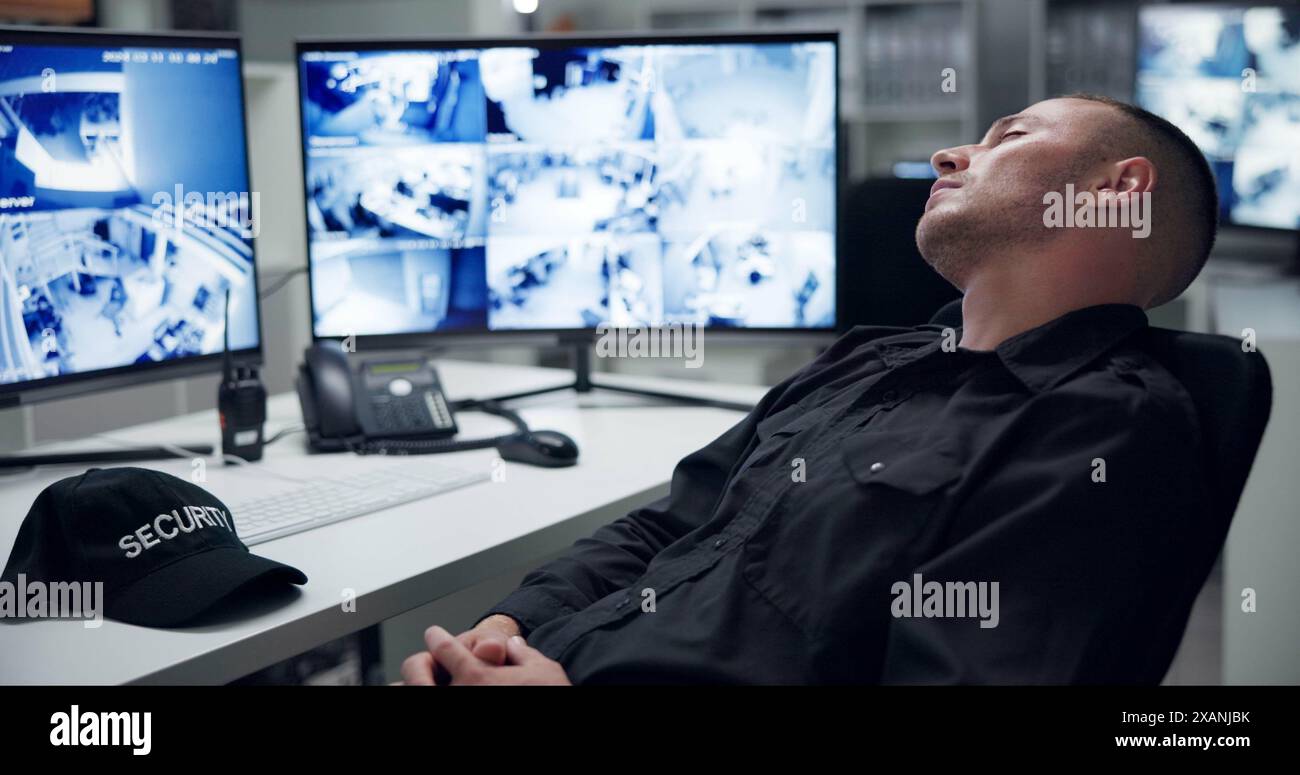 Security guard, computer screen and tired by cctv monitor for ...