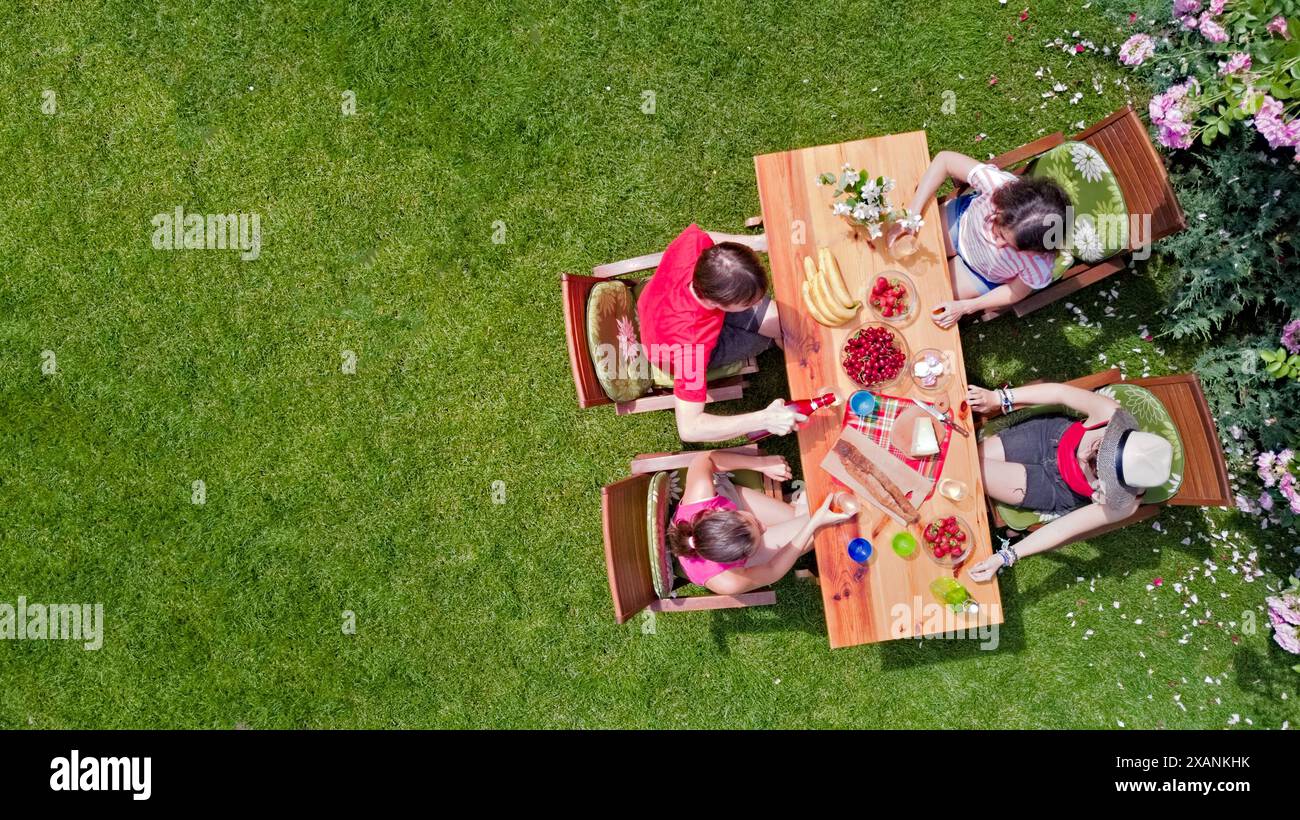 Family table eating from above children hi-res stock photography and ...
