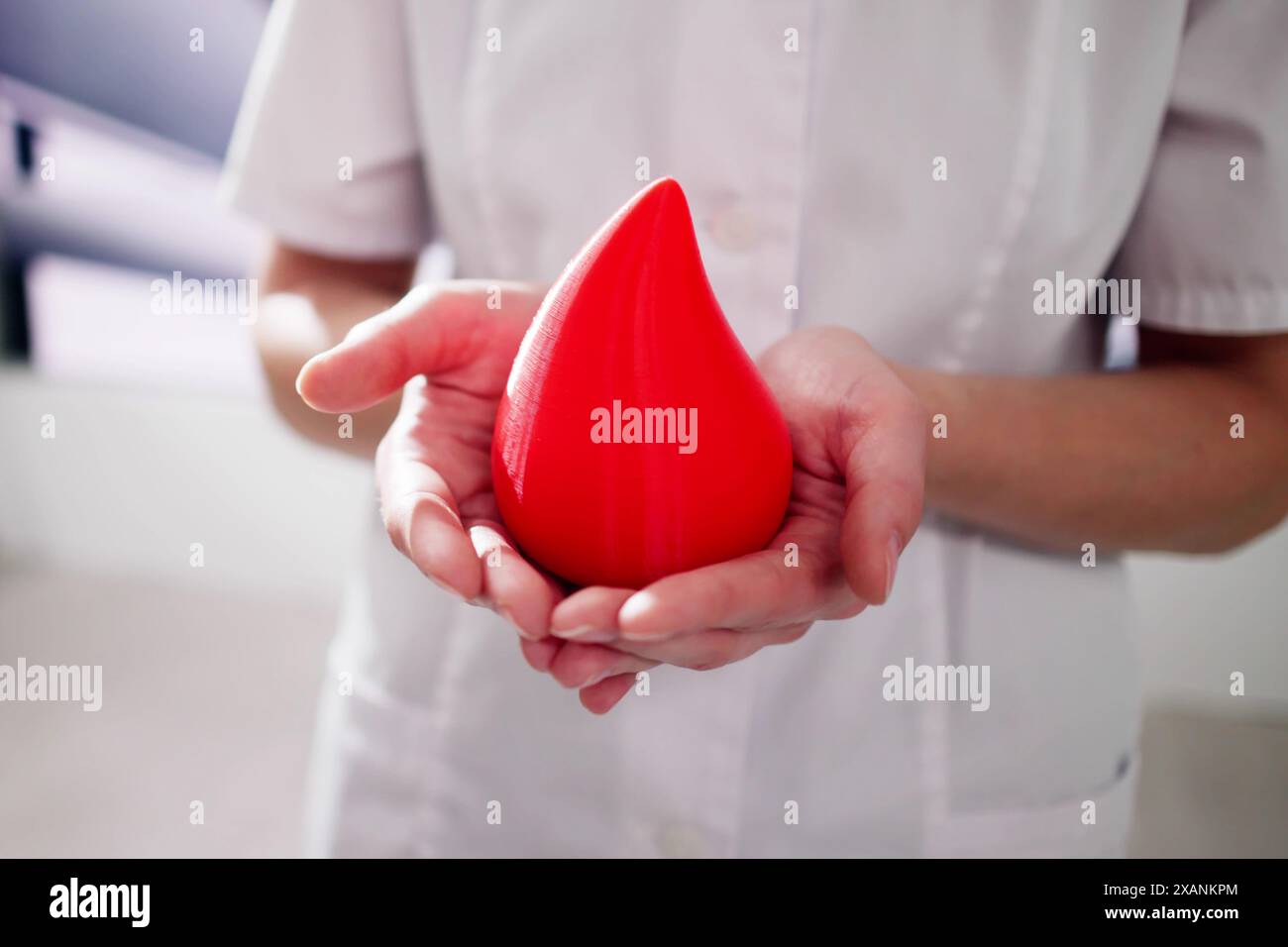 Hemophilia World Day. Doctors With Donor Blood Drop Stock Photo - Alamy