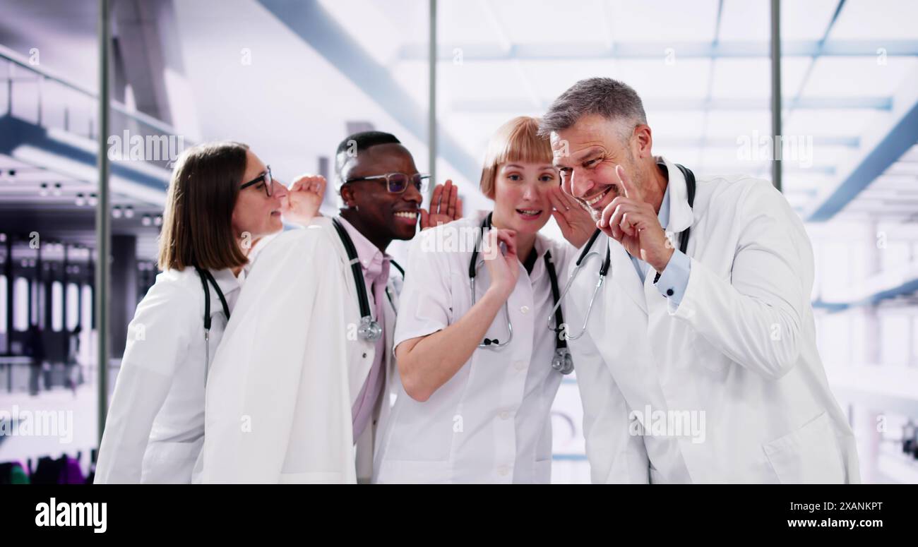 Diverse Group Of Doctors Whispering Gossip Secret Stock Photo - Alamy