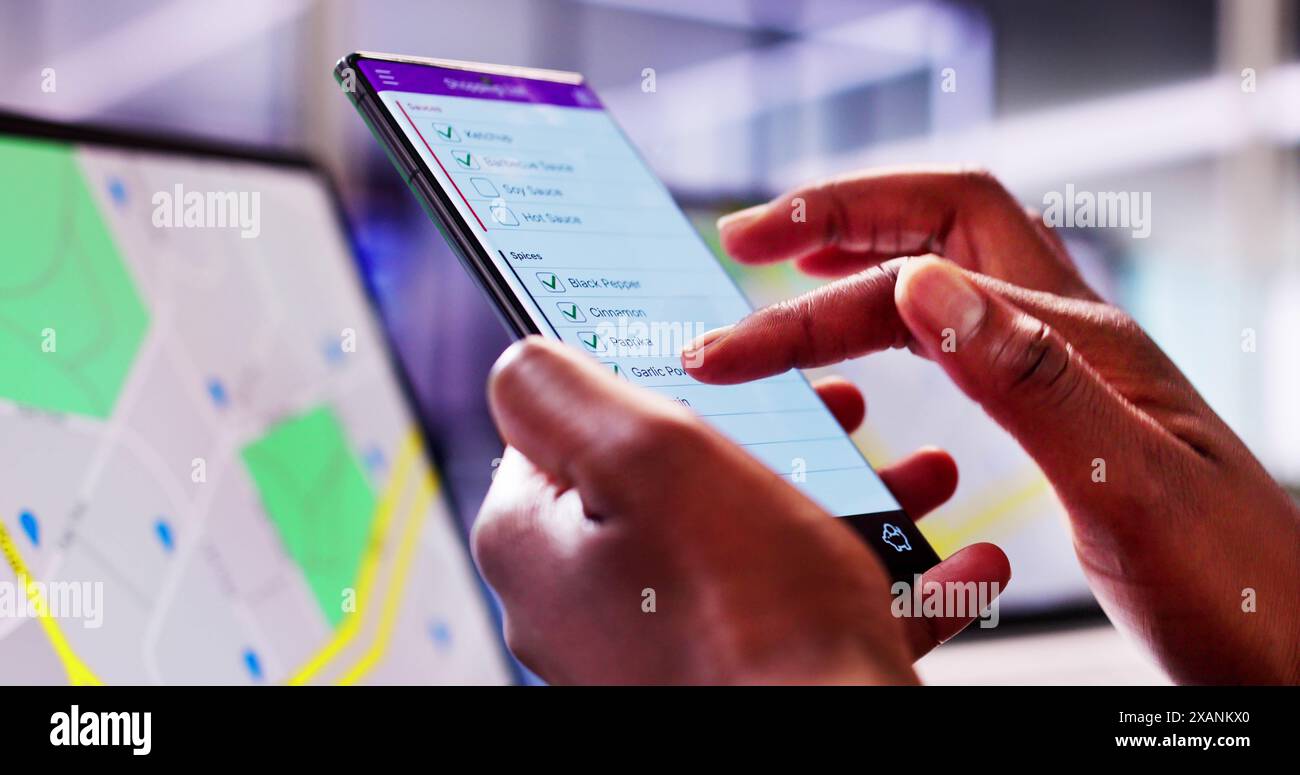 Busy African American Woman Using Grocery Shopping List Mobile App on ...