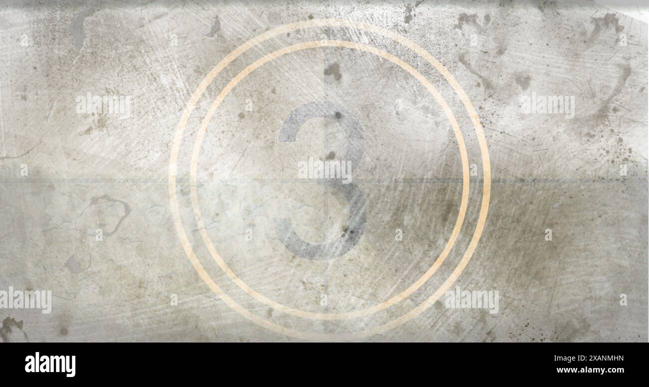 Large number three inside two concentric circles on worn, textured ...