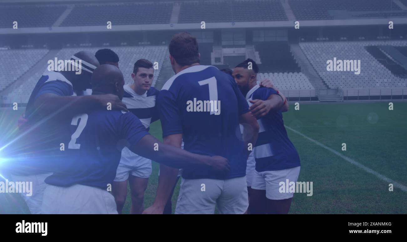 Image of glowing lights over diverse rugby players in sports stadium ...