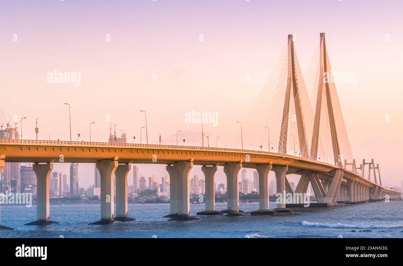A sunset at Bandra Worli Sea link in Mumbai, India. It is a cable ...