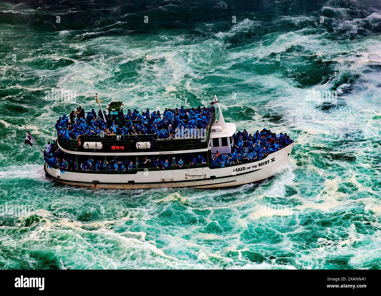 Maid of the Mist tourist boat struggling through heavy water at foot of ...